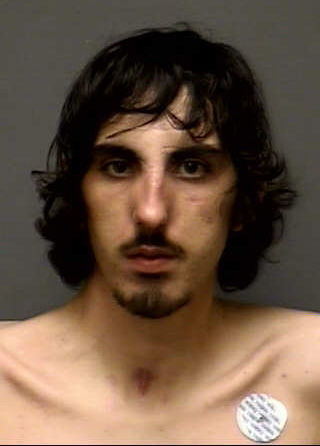 Man charged with setting fire at Motel 6