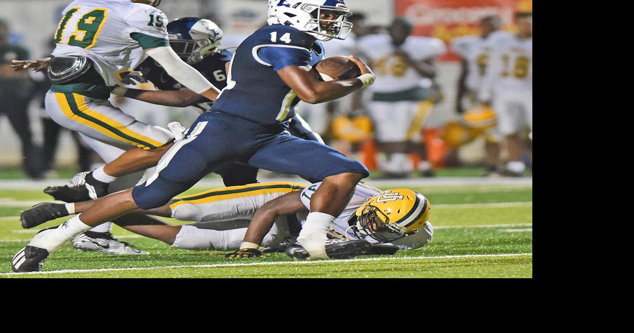 Local football players sign college scholarships