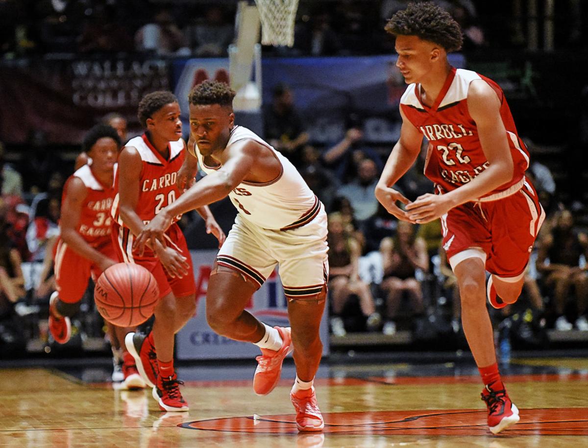 Pruitt’s basket at the buzzer gives Carroll win over Dothan