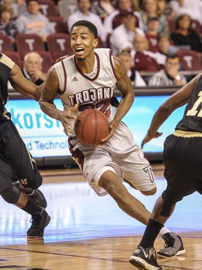 Troy basketball player Tevin Calhoun shows versatility