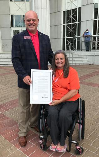 Gravley presents proclamation for United Spinal Association to Harrison ...