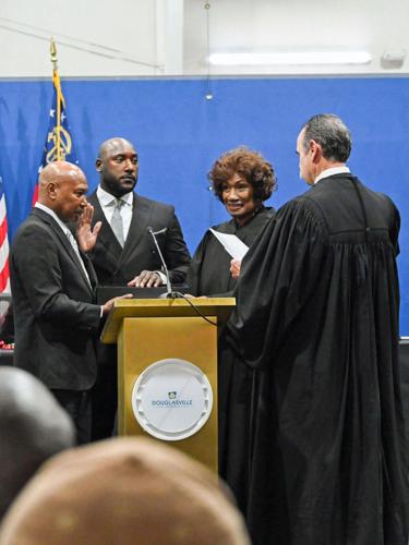 Devetrion Caldwell makes history again as he takes oath | Douglasville ...