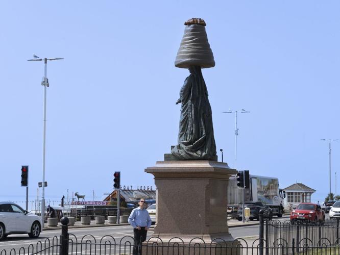 Prankster places giant Walnut Whip on Queen Victoria statue | National ...