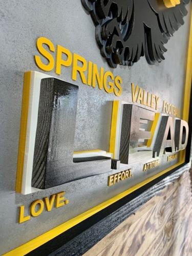 New hand-crafted LED sign aims to pump-up Blackhawks' football | News ...