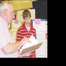 Connor Blair stands by as his science fair project | News ...