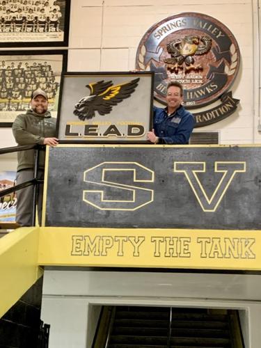 New hand-crafted LED sign aims to pump-up Blackhawks' football | News ...