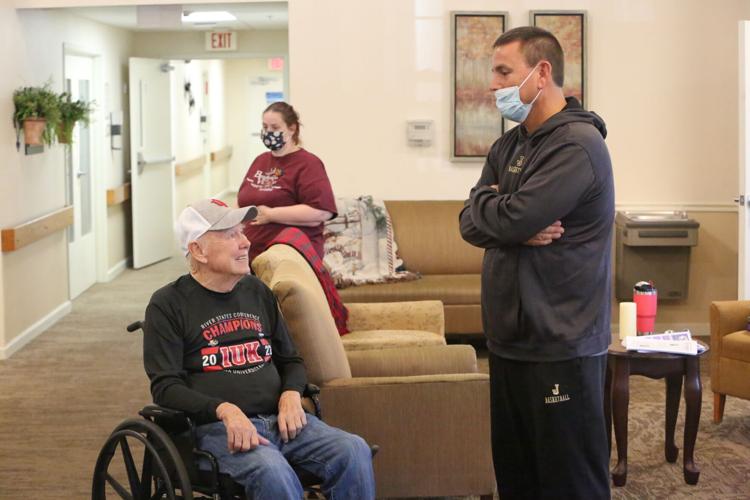 Wildcat boys spread cheer, decorate trees | Sports | duboiscountyherald.com