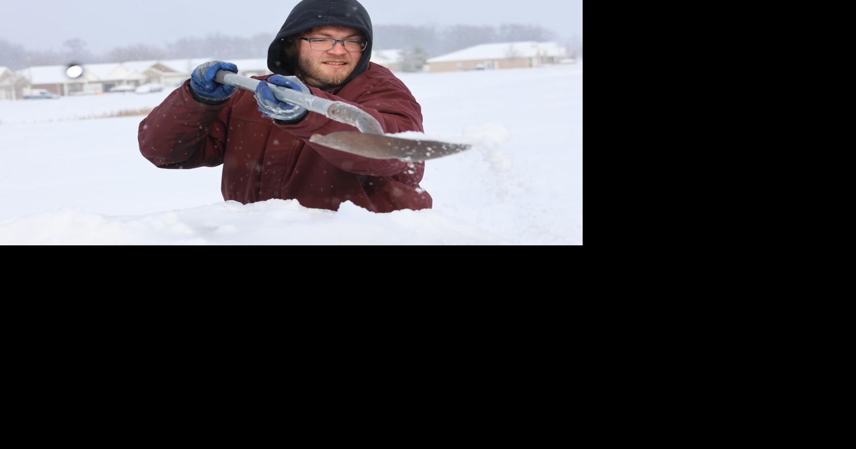 Area residents begin shoveling out from season's first snow storm ...