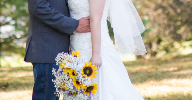 Emily Troesch and Tyler George | Weddings | duboiscountyherald.com