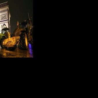 Farmers enter Paris on tractors in protest at trade deal | National ...