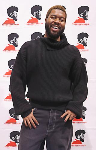 Photos: Pop star Khalid brings Christmas cheer to Hueco Elementary ...