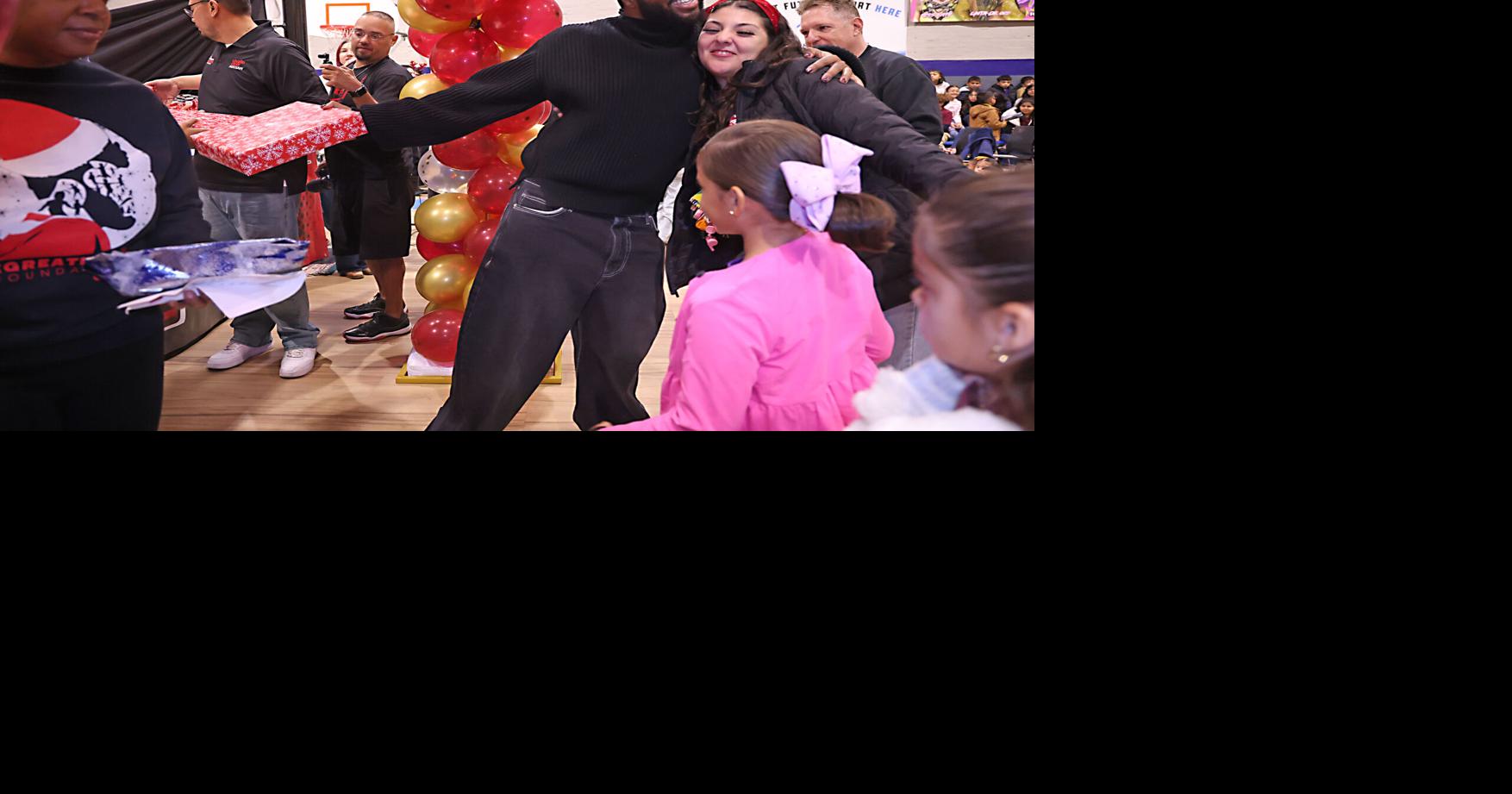 Photos: Pop star Khalid brings Christmas cheer to Hueco Elementary ...