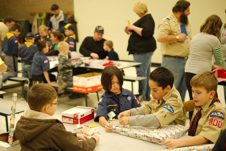 Cub scouts wrap gifts for needy families | News | emporiagazette.com