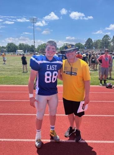 Lane Darbro 8-man All-Star Game with coach | | emporiagazette.com
