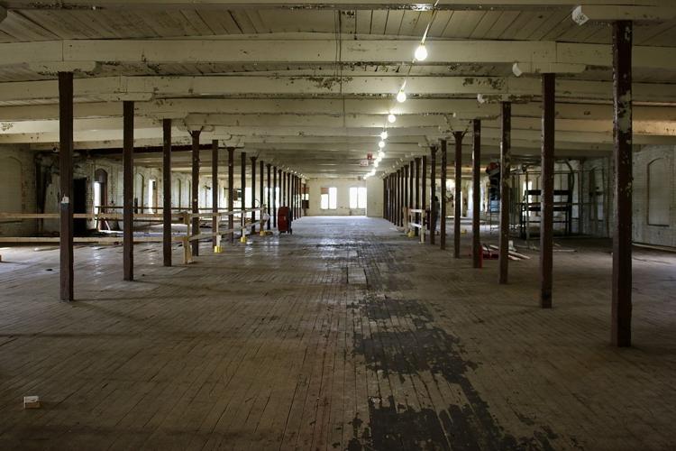 Former factory being repurposed into apartments breaks ground ...