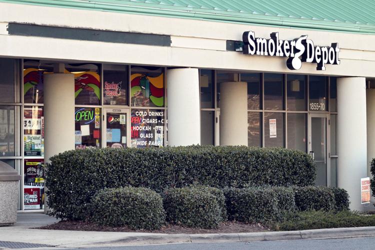 Four charged in smoke shop raids | News | enquirerjournal.com