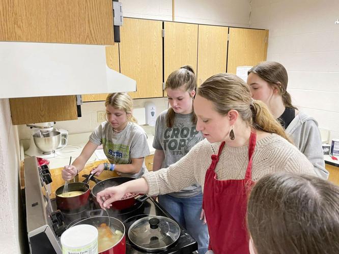 Lesson immerses Edwards County high schoolers in pork production ...