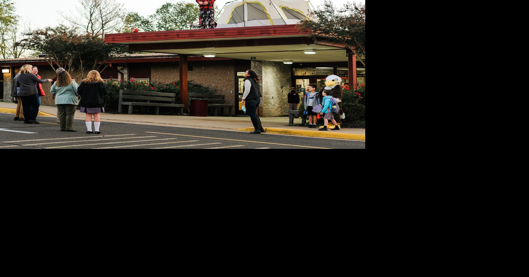 St. John principal camps out on school roof to pay off a bet ...