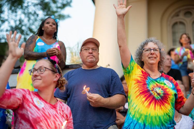 PHOTO: Mourners fill courthouse steps for vigil in memory of Pablo Teodoro, Great Harvest owner ...