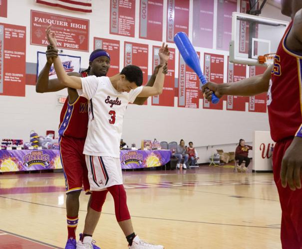 PHOTOS: Comedy basketball team performs at Head Start fundraiser ...