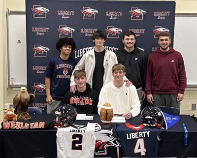 LIBERTY FOOTBALL: Record-setting receivers Caporaletti and Triplett ...