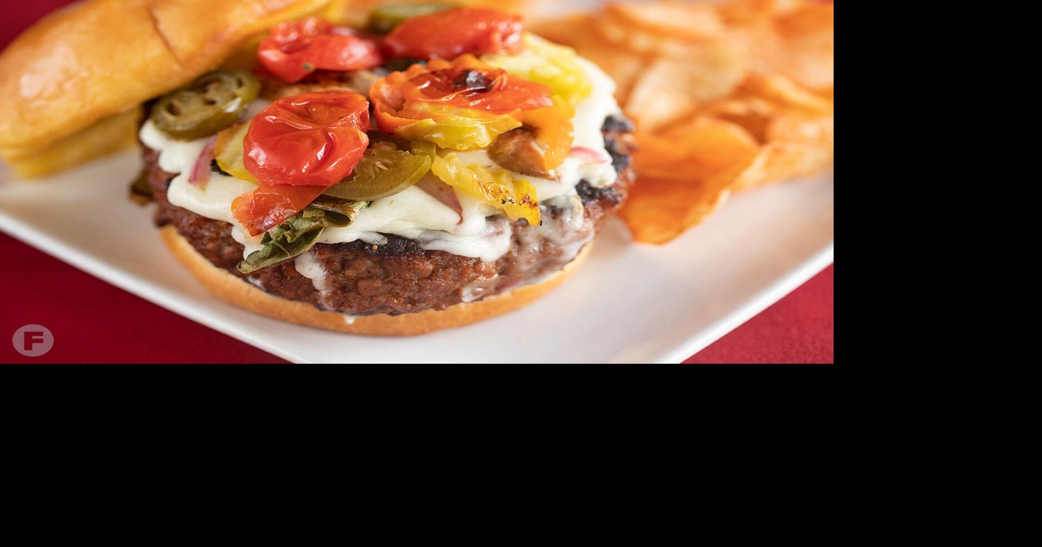 In Da Loop serves up wood-fired fare and plenty of entertainment from a ...