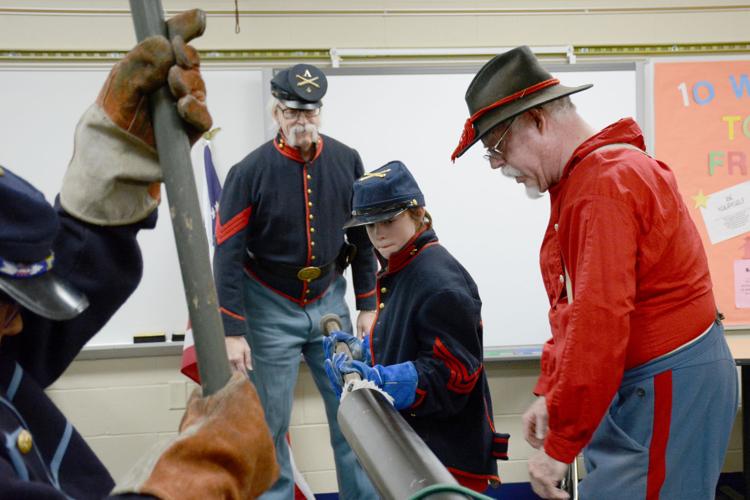 Civil War re-enactors involve RCI students in mock artillery drill ...