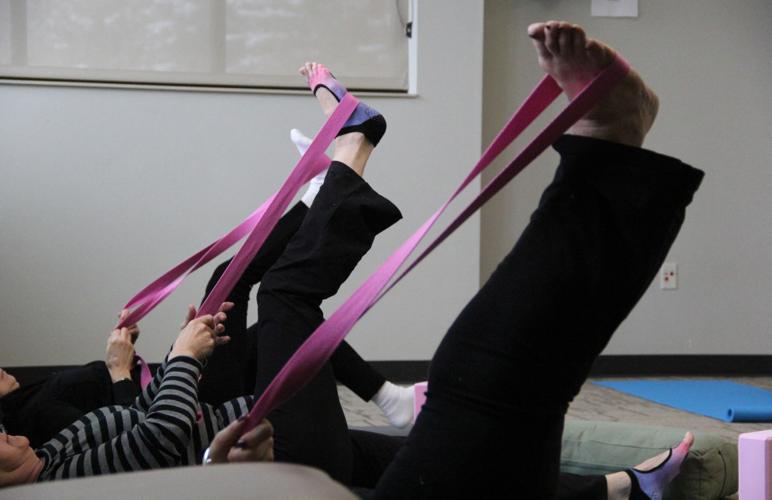 Senior center instructor, students stay young through yoga | Community ...