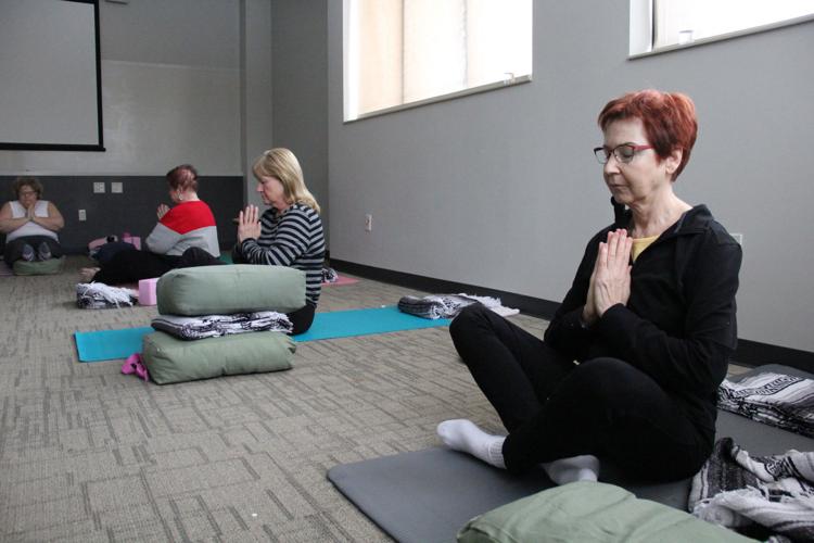 Senior center instructor, students stay young through yoga | Community ...