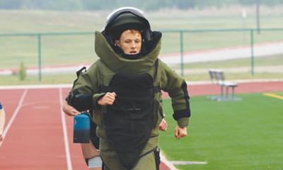 World record defused: Fort Cavazos captain runs fastest bomb suit mile ...