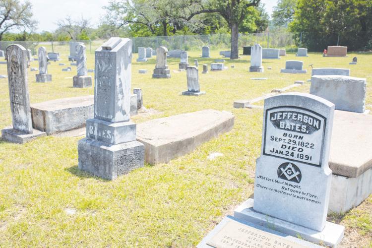 Cemeteries boast new flowers from visitors, descendants of families ...