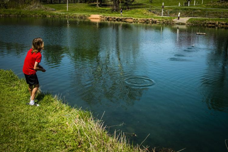 kid skipping rocks