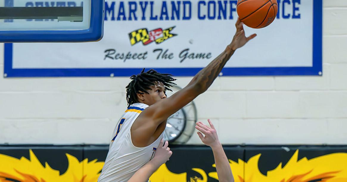 Grand Kenyon: Johnson gets 1,000th point as Lions roll past Cougars ...