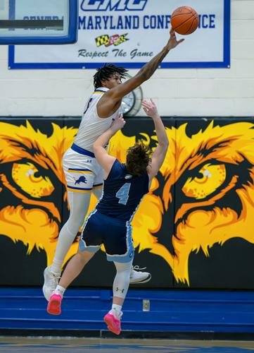 Grand Kenyon: Johnson gets 1,000th point as Lions roll past Cougars ...