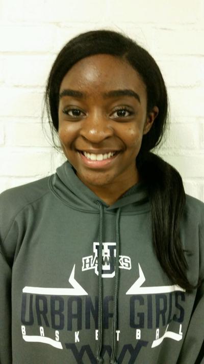 Center of attention: When opponents swarm Urbana's Carmen Kweti in ...