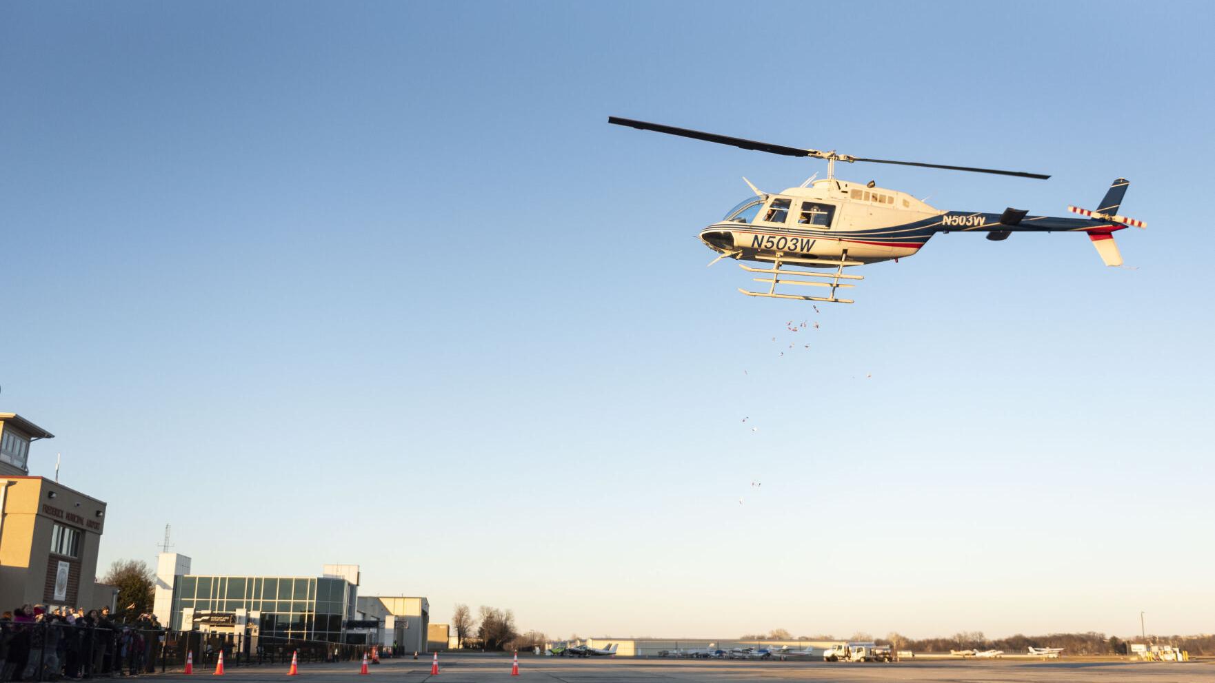Children enjoy falling sweets at sunset to celebrate final night of ...