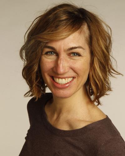 On a tree-lined golf course, a bright red wind phone invites visitors ...