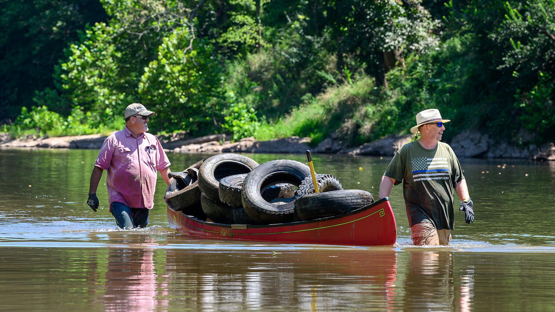 Volunteers pull tires, trash out of Monocacy River during cleanup event ...