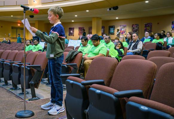 Students, families urge school board to keep neighborhoods together in ...