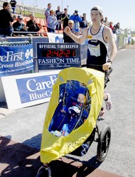 Runner sets world record for pushing stroller in marathon | Archive ...