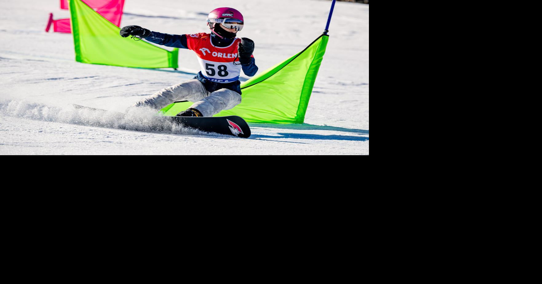 A riser on the slopes, Urbana sophomore Emily Dinh competes at ...