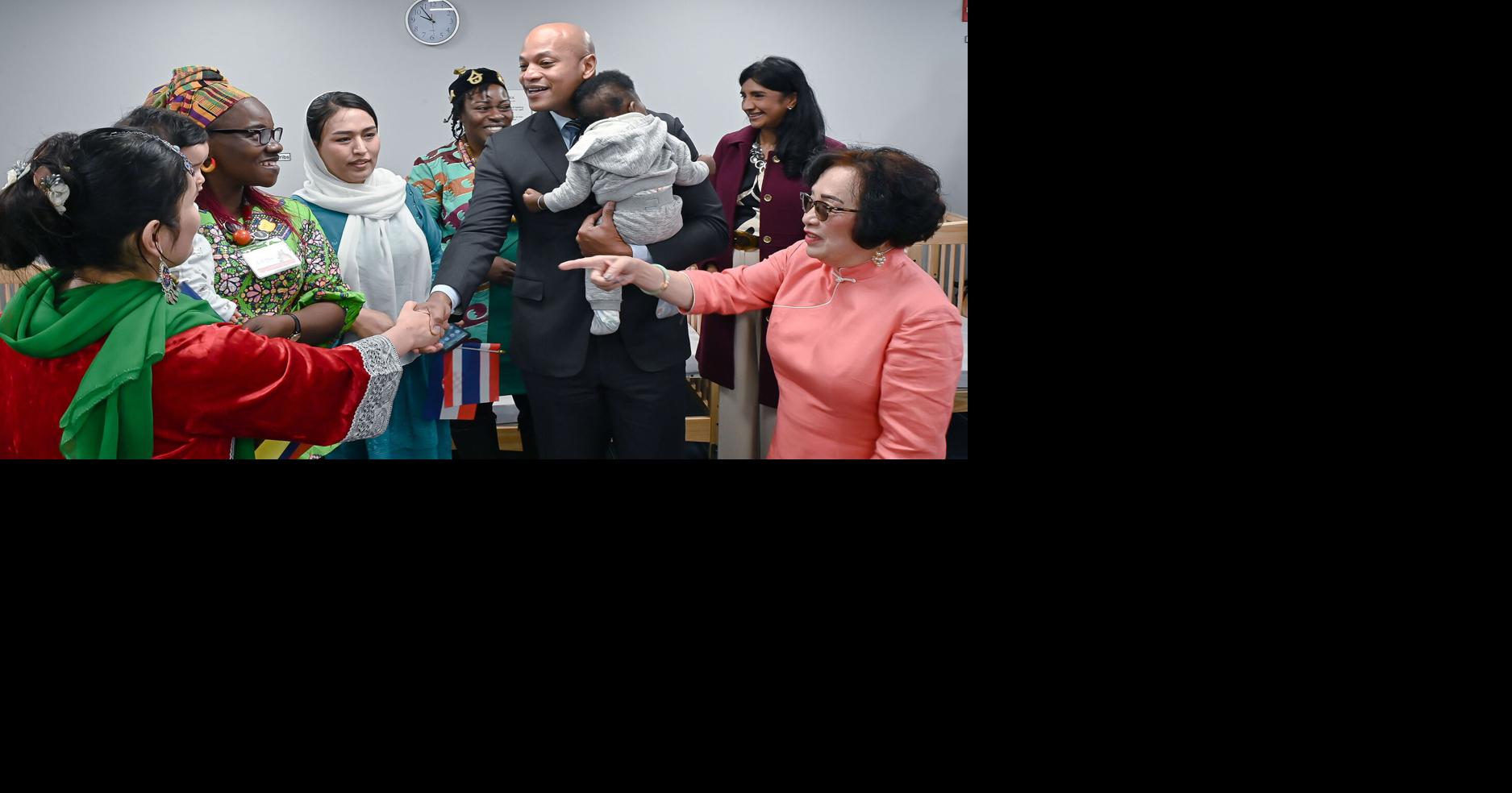 'It's like love': Moore helps celebrate opening of Asian American ...
