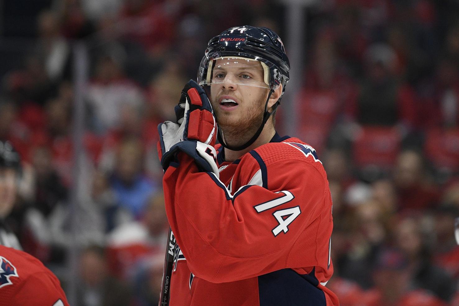 Capitals' Carlson is focusing on present with season on pause ...