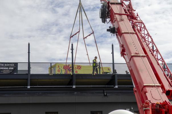 Crane lifts food truck onto rooftop of new downtown Frederick ...