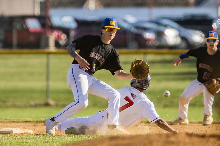 Doing the job: Lions’ Buschman drives in deciding runs to win opener ...