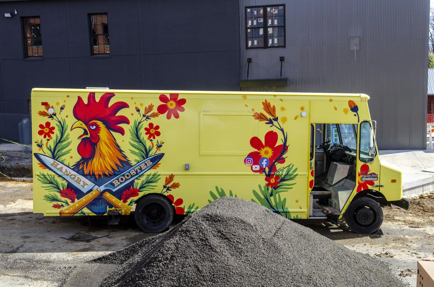 Crane lifts food truck onto rooftop of new downtown Frederick ...