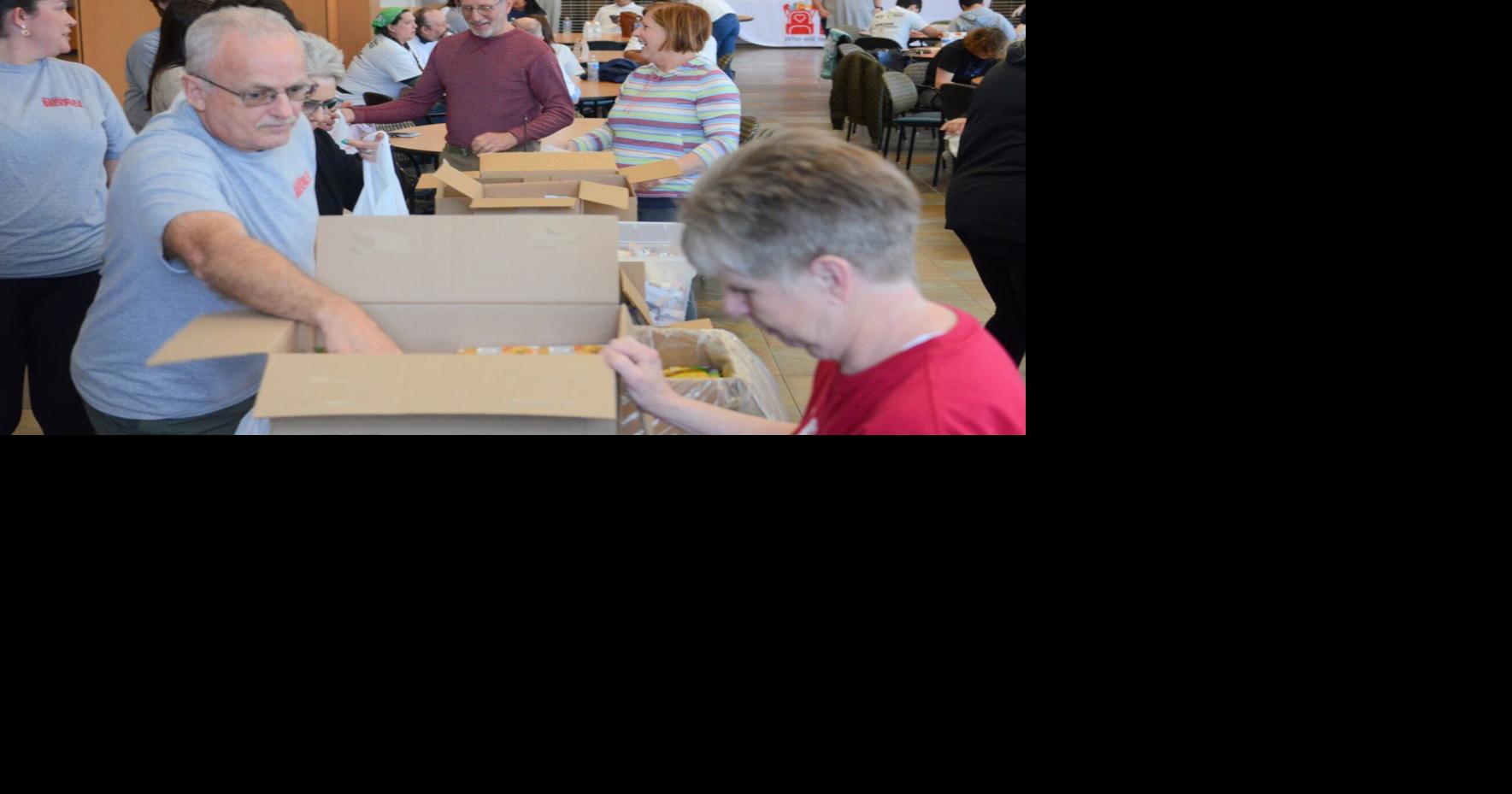 Community competes to help nonprofit pack hundreds of bags of food for ...