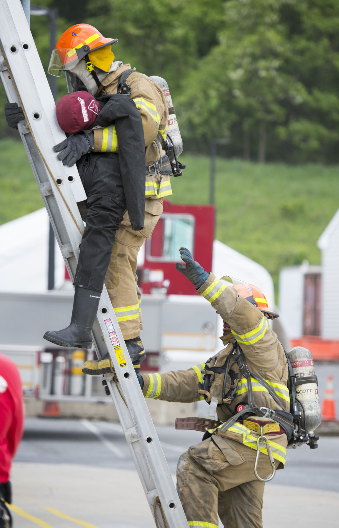 Answering the call: Recruits brave ladders in training exercise | Fire ...
