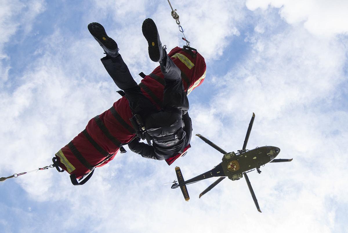 State police, local rescue personnel practice helicopter hoist rescues ...