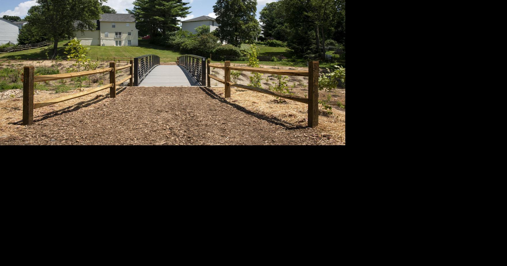 New foot bridge caps public safety and stormwater management project ...